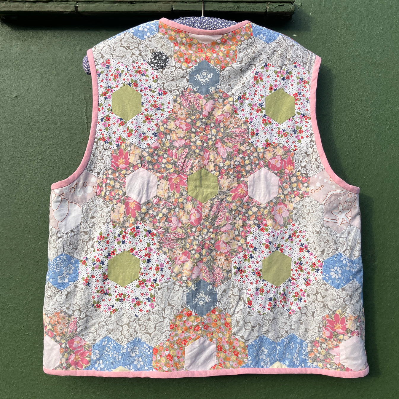 Hand-pieced recycled patchwork quilt vest waistcoat – a circular story