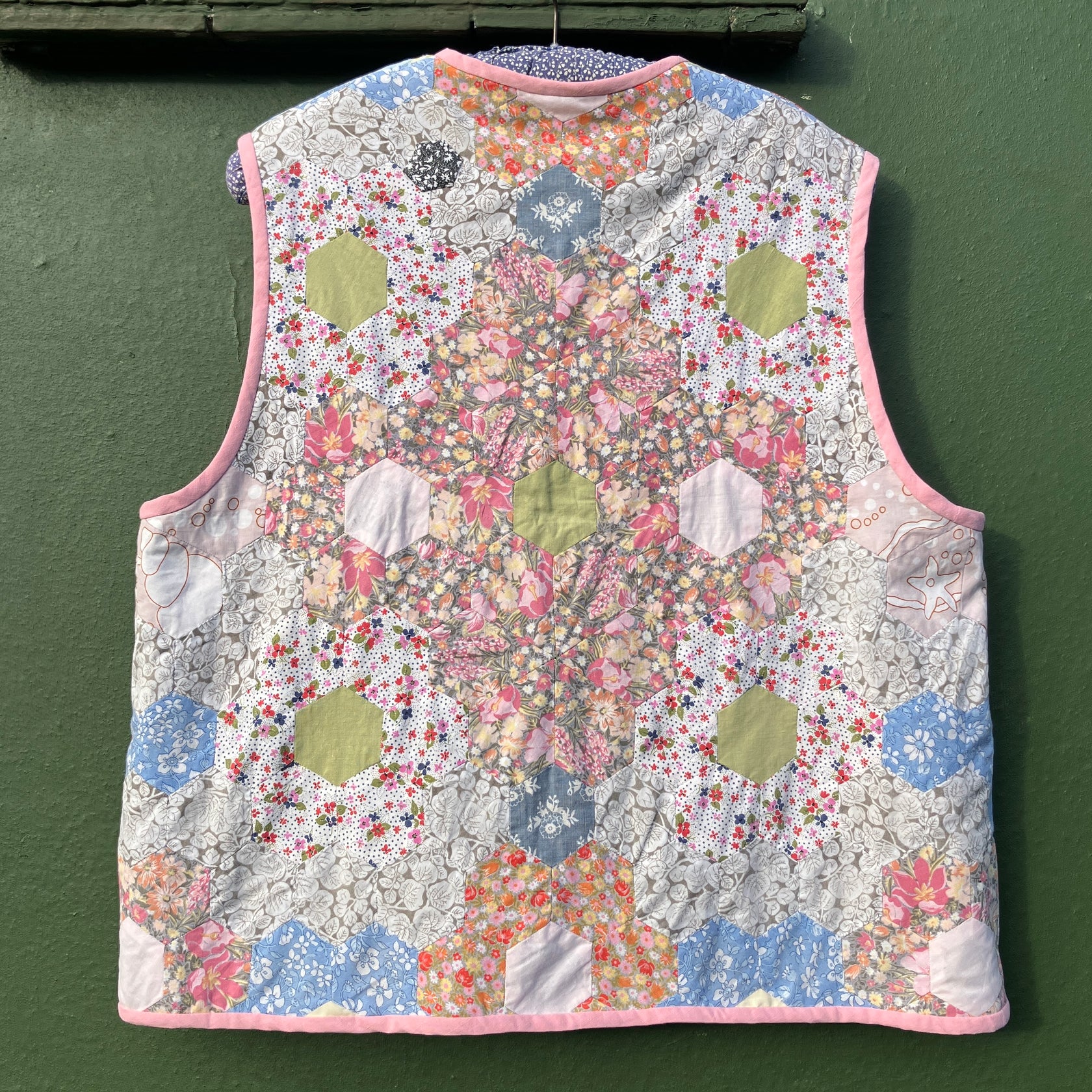 Hand-pieced recycled patchwork quilt vest waistcoat – a circular story