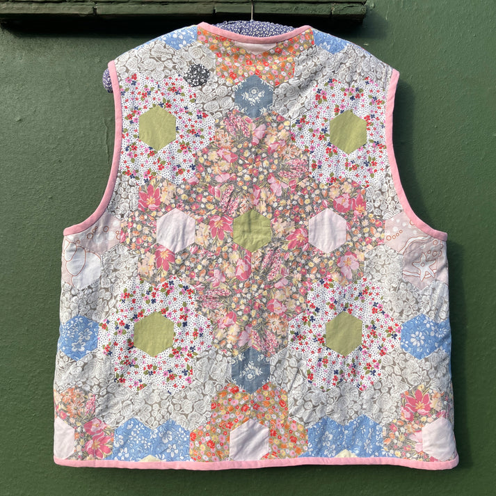 Hand-pieced recycled patchwork quilt vest waistcoat – a circular story