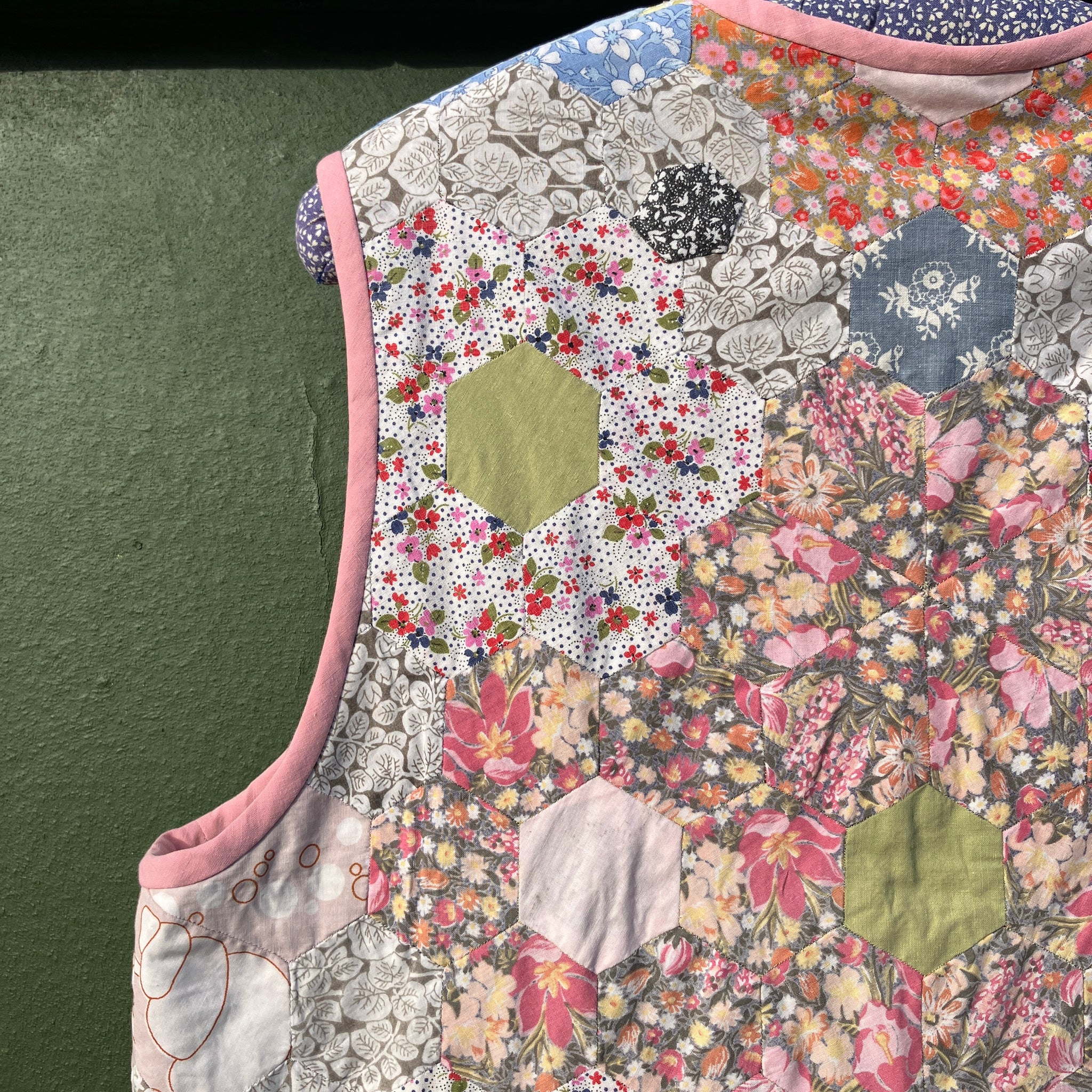 Hand-pieced recycled patchwork quilt vest waistcoat – a circular story