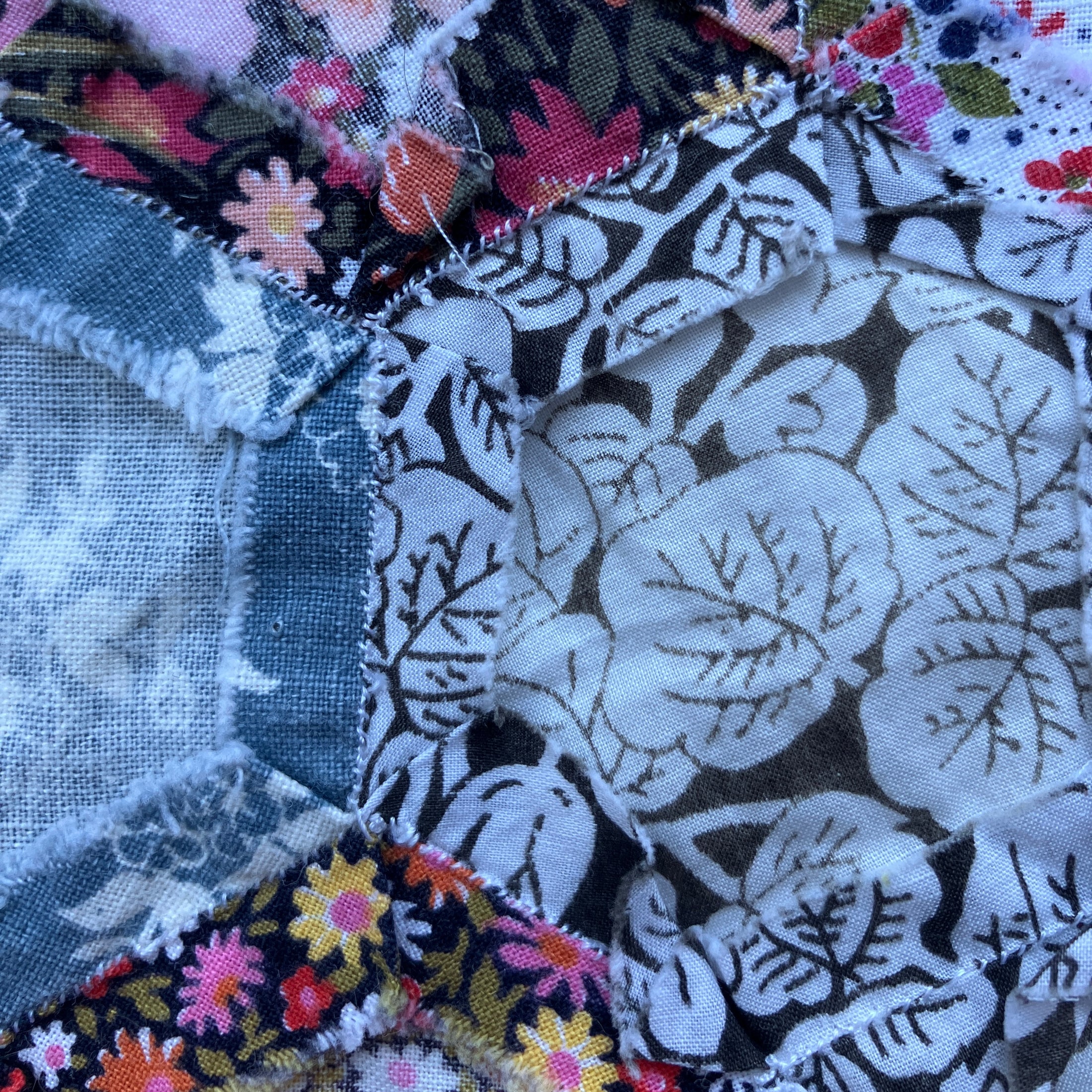 Hand-pieced recycled patchwork quilt vest waistcoat – a circular story